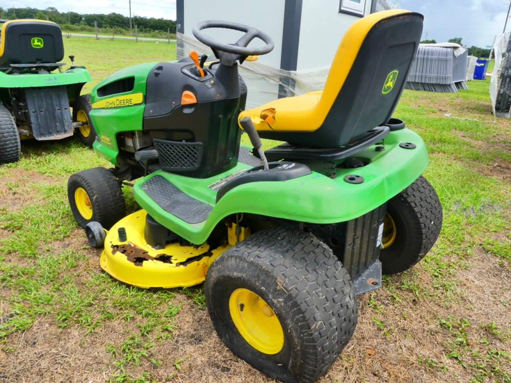 #493 - John Deere LA120 Riding Mower | DeMott Auction