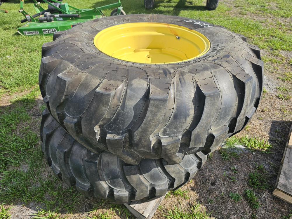 #615A - (2) 420/85D24 R4 Tires on John Deere Wheels | DeMott Auction