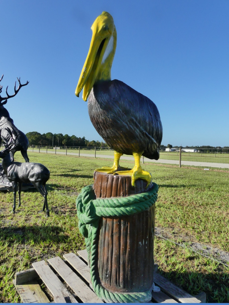 #2208 - Metal Pelican Statue | DeMott Auction