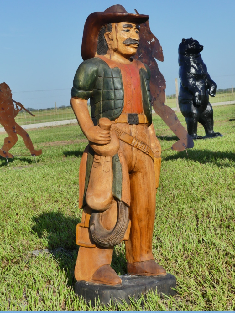 #2205 - Wooden Cowboy Statue | DeMott Auction