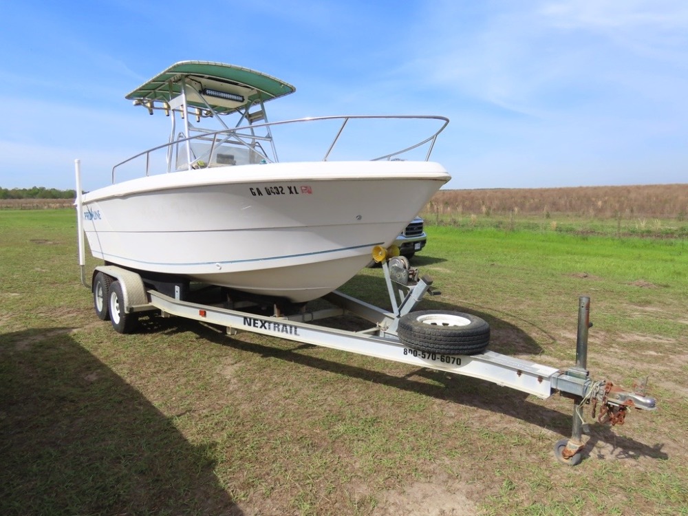 #2265H - 1995 Proline 21' Boat w/ Nextrail Trailer | DeMott Auction