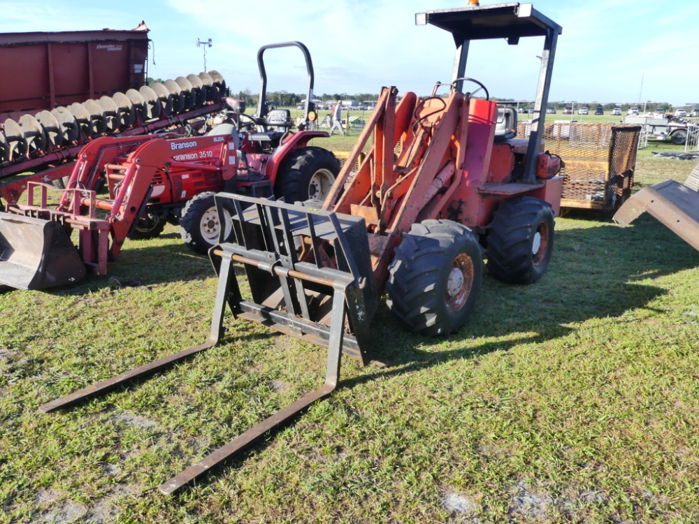 #937 - WILMAR ARTICULATING LOADER | DeMott Auction