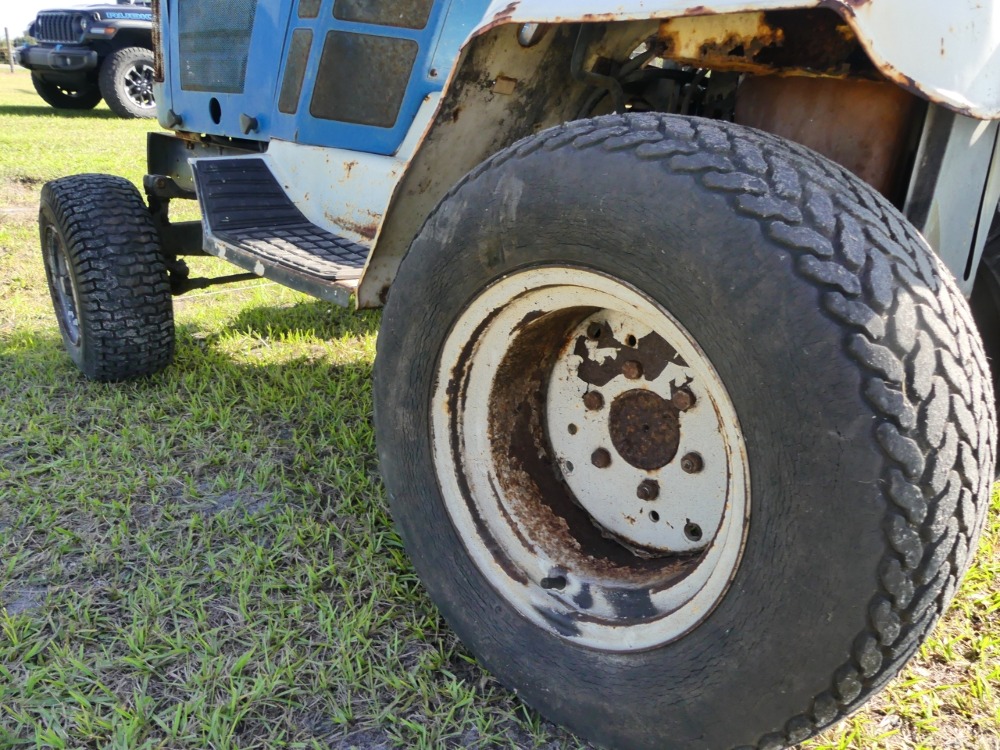 #1017 - Ford LGT14D Lawn Tractor | DeMott Auction