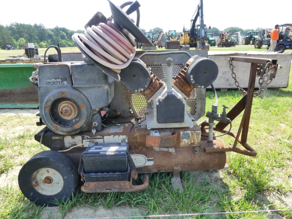 #116 - Kohler Magnum Air Compressor w/ Hose Reel | DeMott Auction